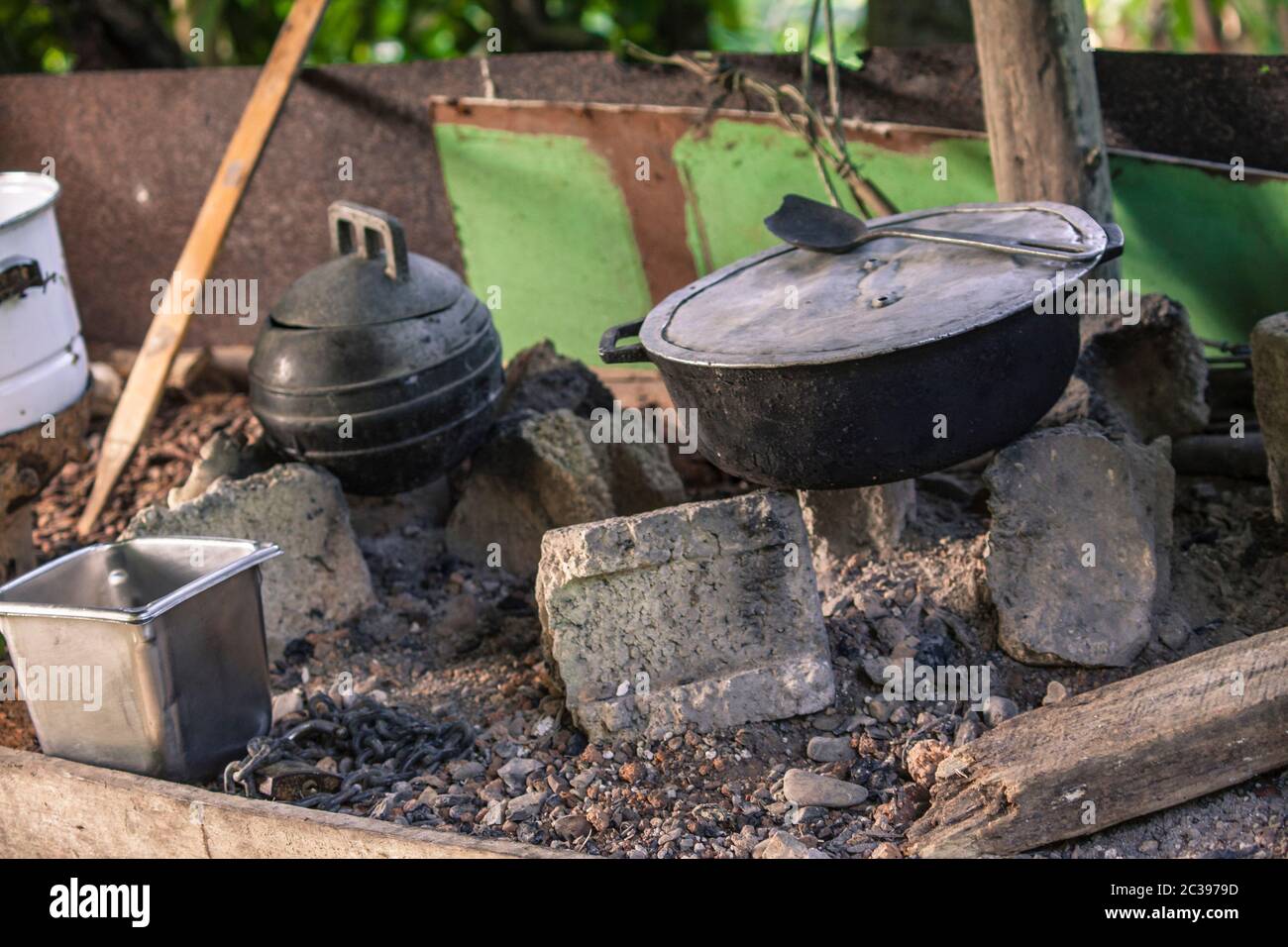 Pots in a shack in rustic farm in Dominican Republic Stock Photo - Alamy