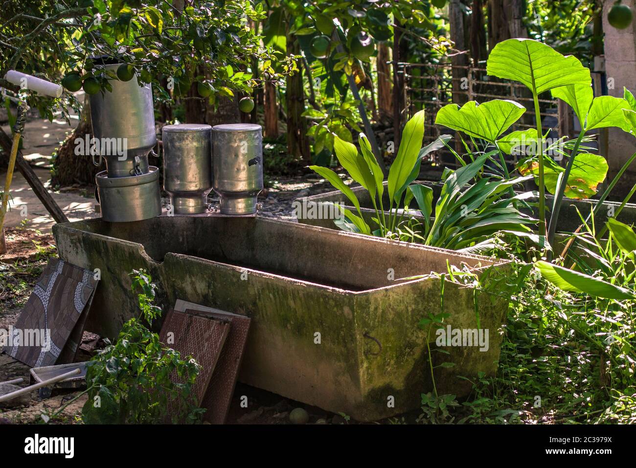 Pots in a shack in rustic farm in Dominican Republic Stock Photo - Alamy