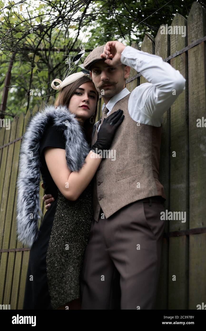 Portrait of a beautiful couple in vintage style. Retro style, classic ...