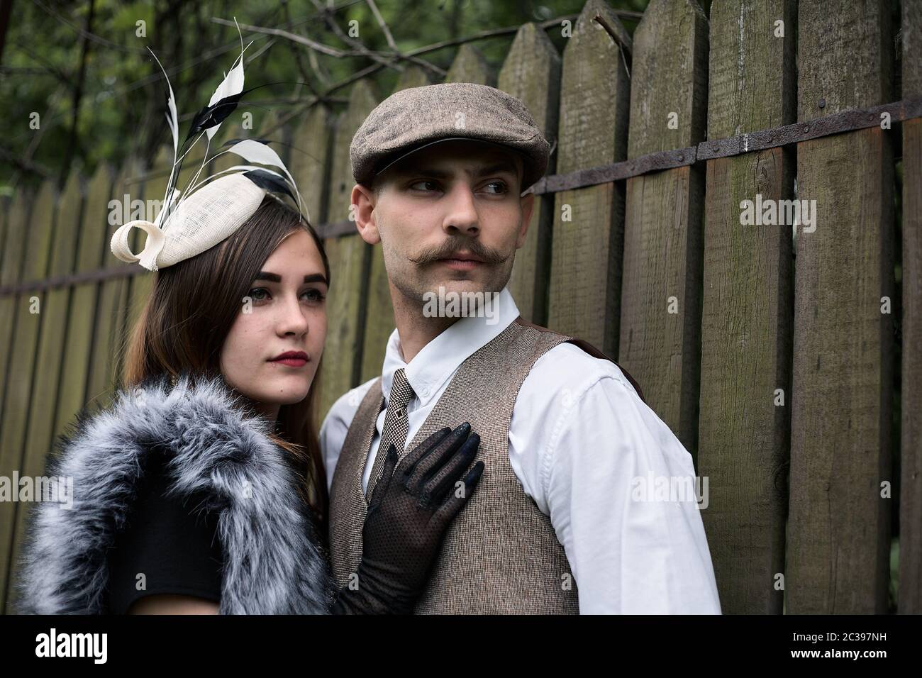 Portrait of a beautiful couple in vintage style. Retro style, classic ...