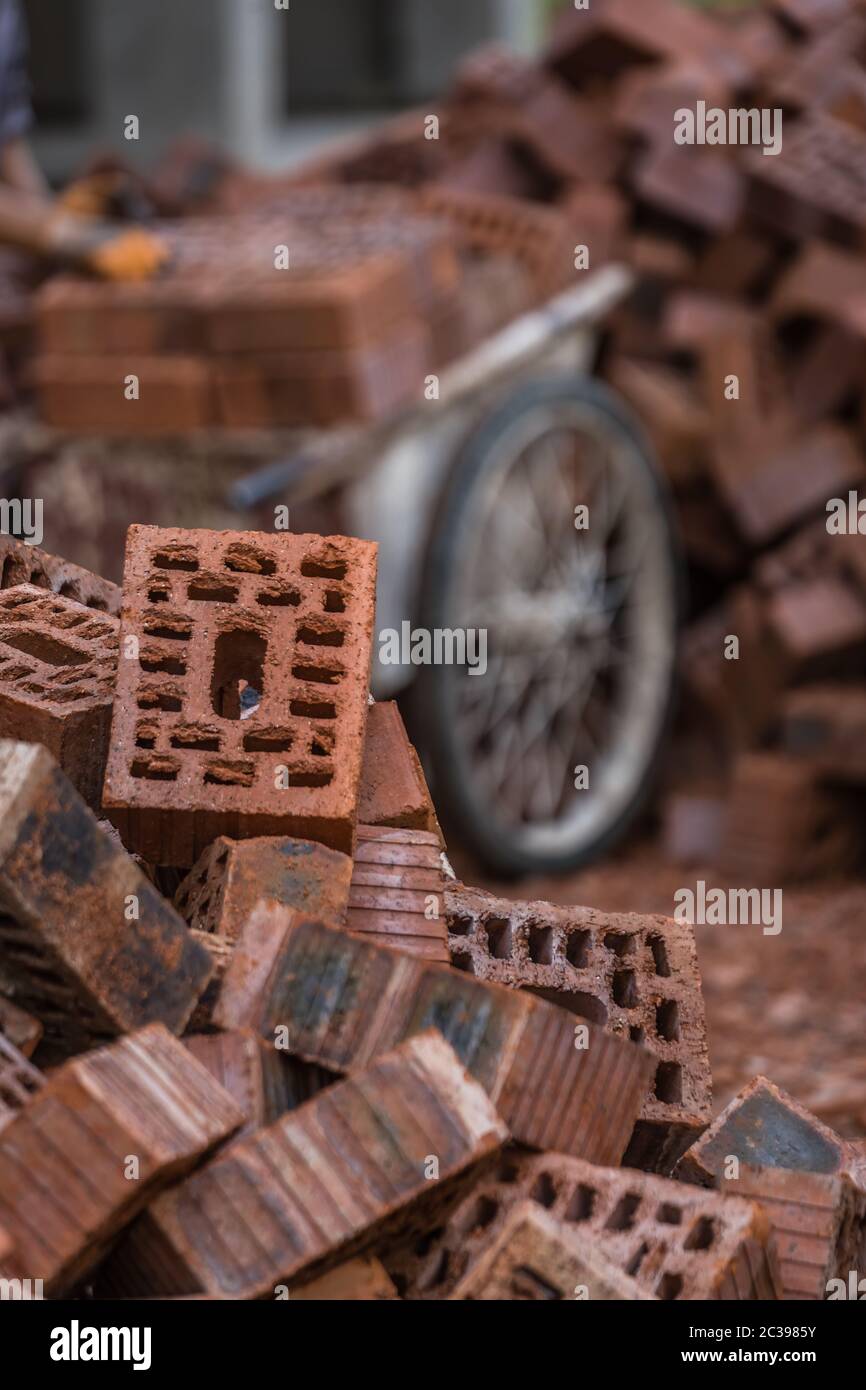 Pile of bricks on the building site Stock Photo - Alamy
