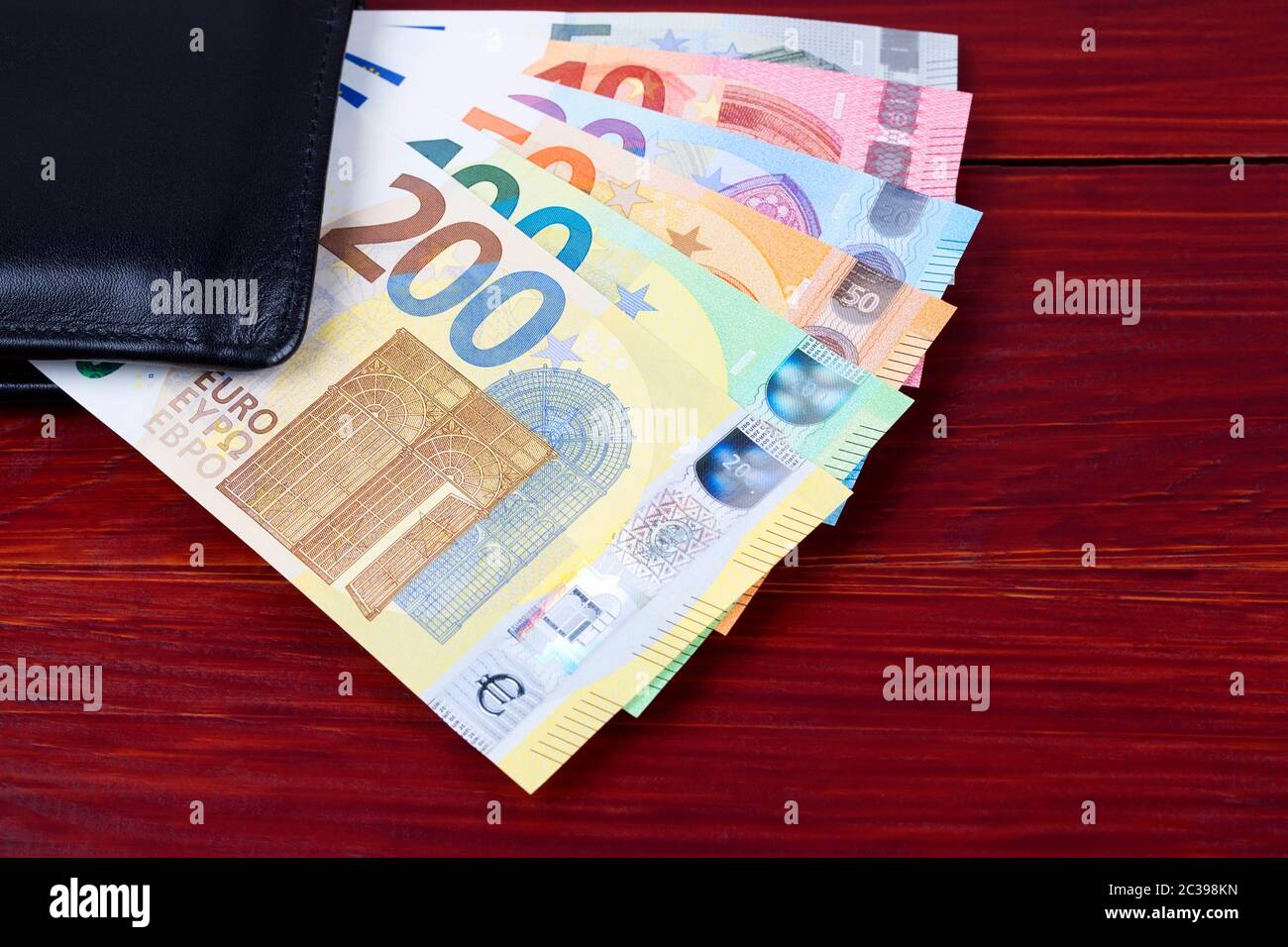 New series of european money in the black wallet Stock Photo - Alamy