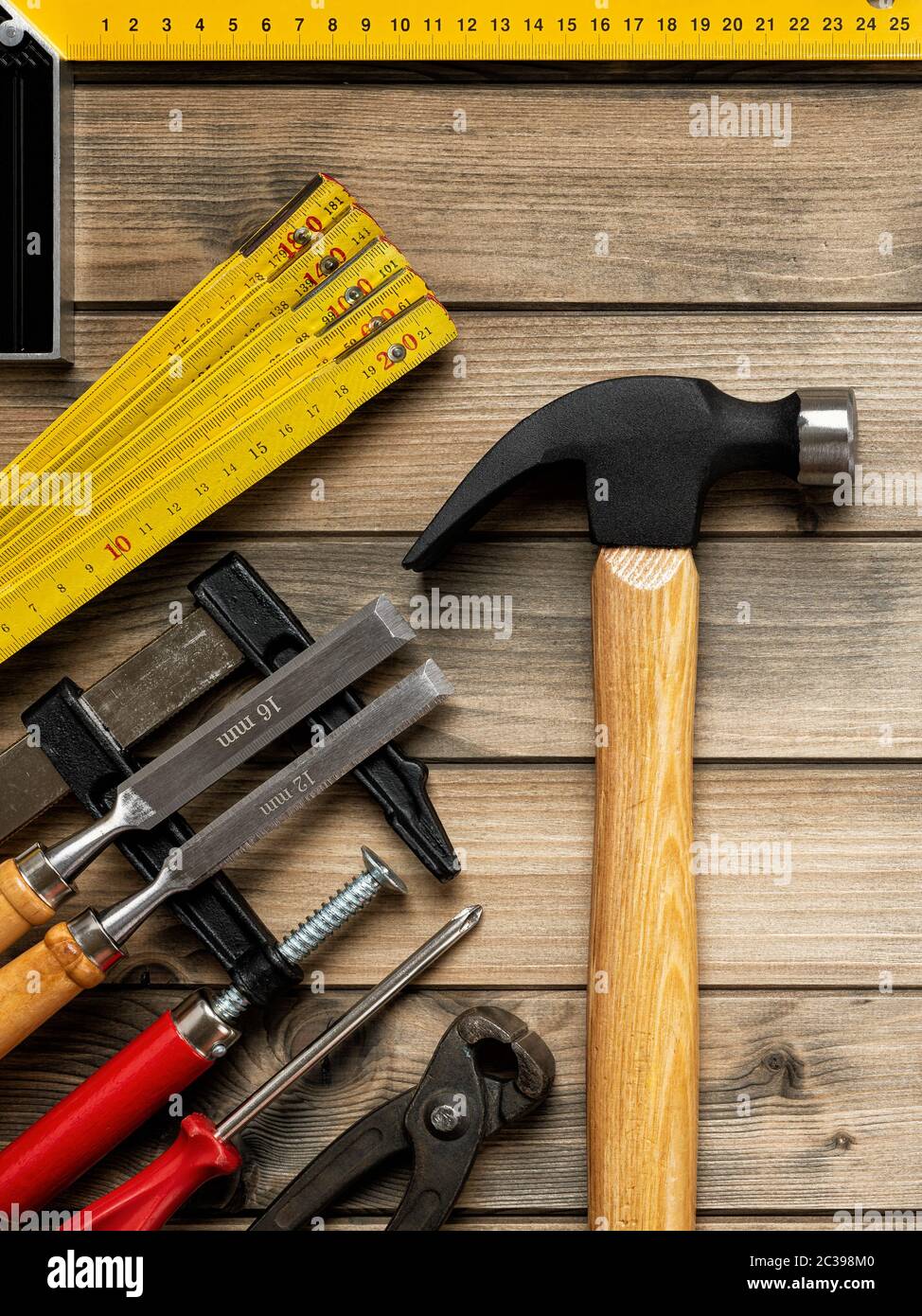 Top view of carpenter work tools on an antique wooden table ...