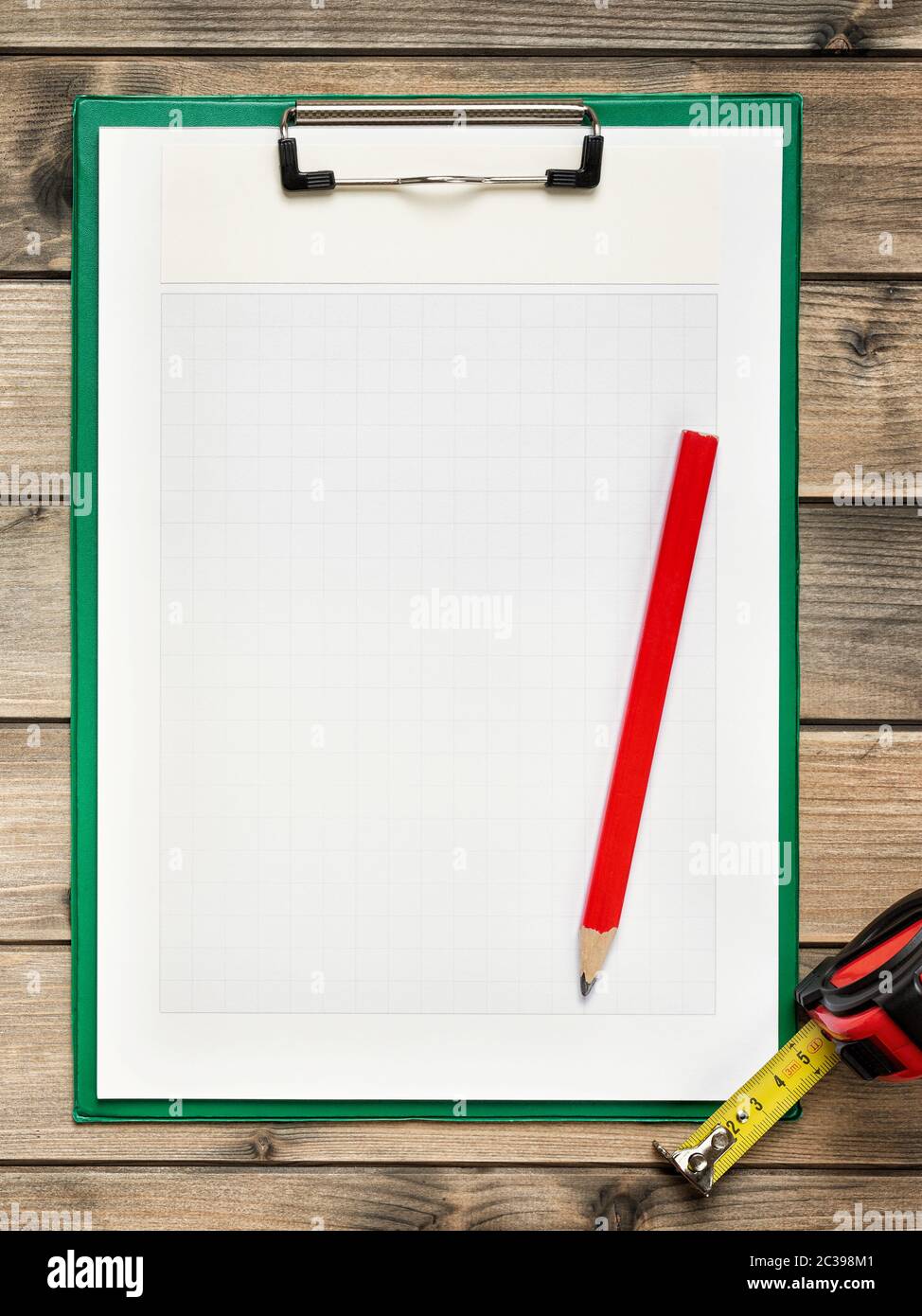 Top view of carpenter work tools and notebook for notes on an antique ...