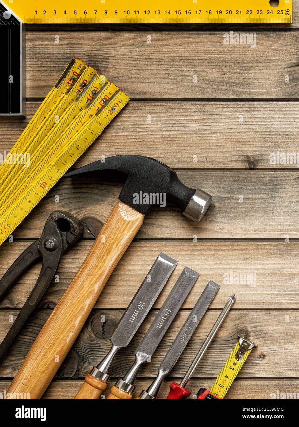 Top view of carpenter work tools on an antique wooden table ...