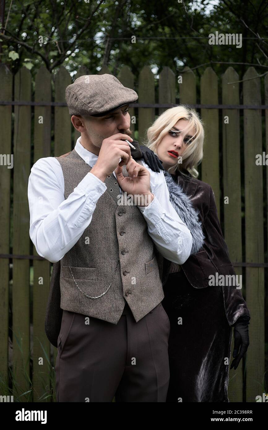 Portrait of a beautiful couple in vintage style. Retro style, classic ...
