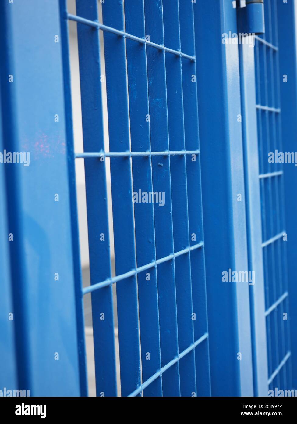 blue metal fence useful as a background Stock Photo - Alamy