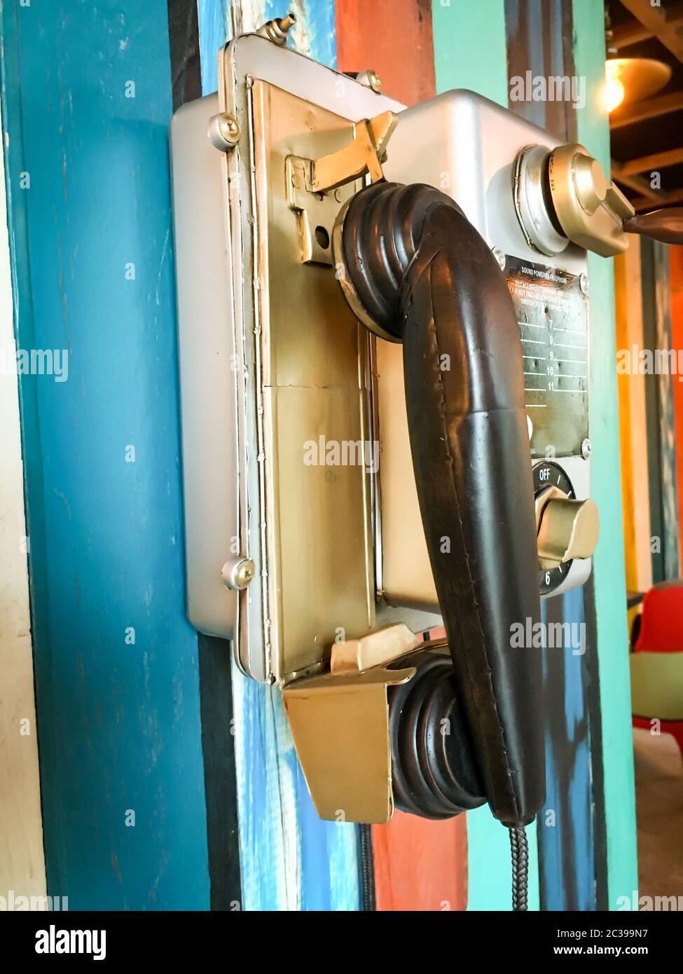 an old English phone on a wall Stock Photo - Alamy
