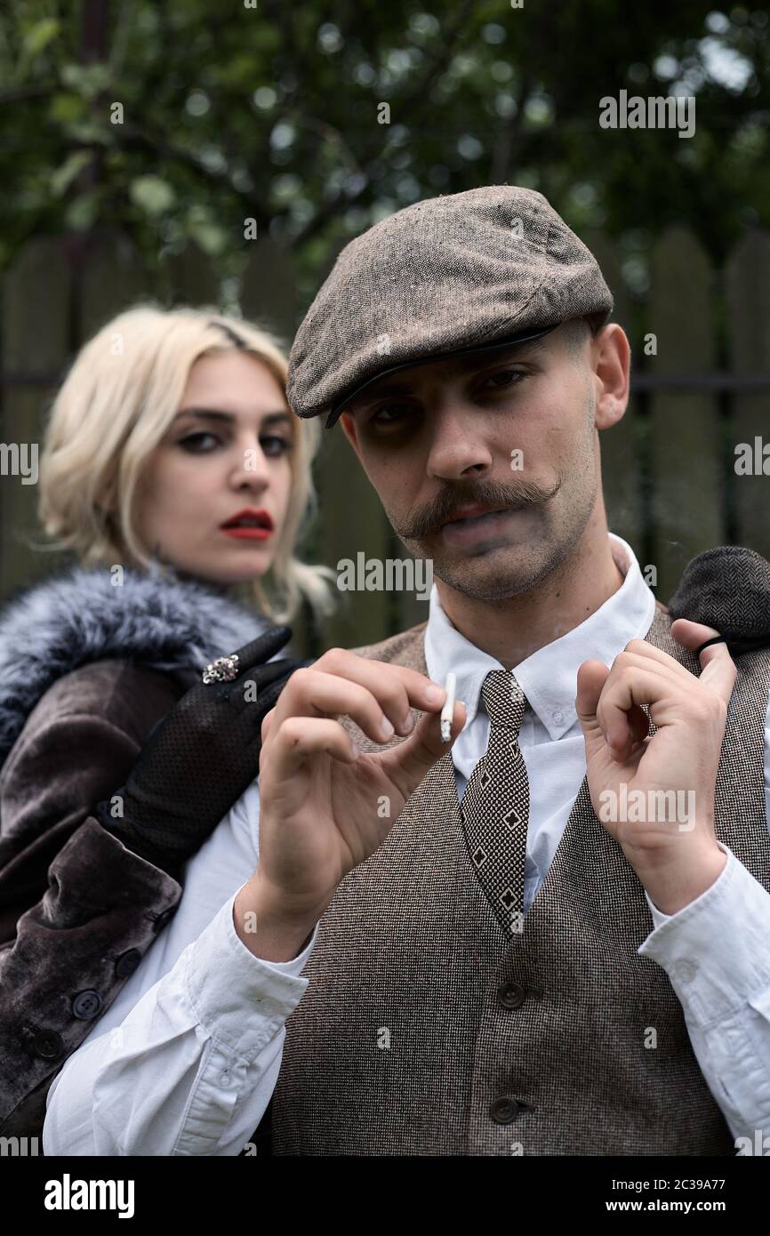 Portrait of a beautiful couple in vintage style. Retro style, classic ...