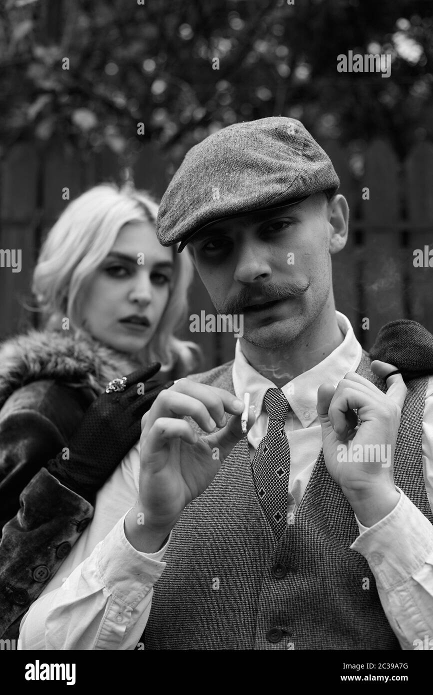 Portrait of a beautiful couple in vintage style. Retro style, classic ...