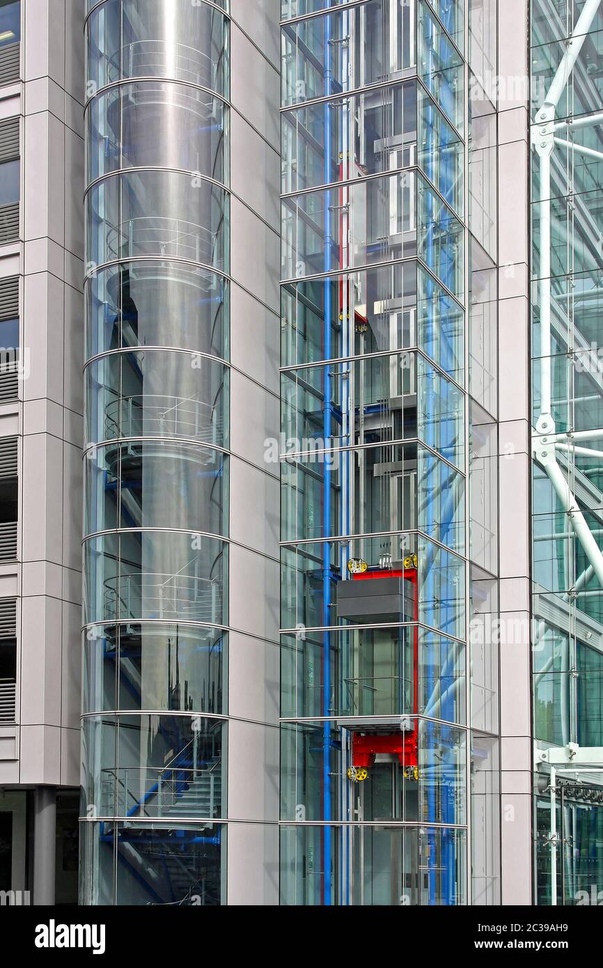 Glass elevator in modern new office building Stock Photo - Alamy