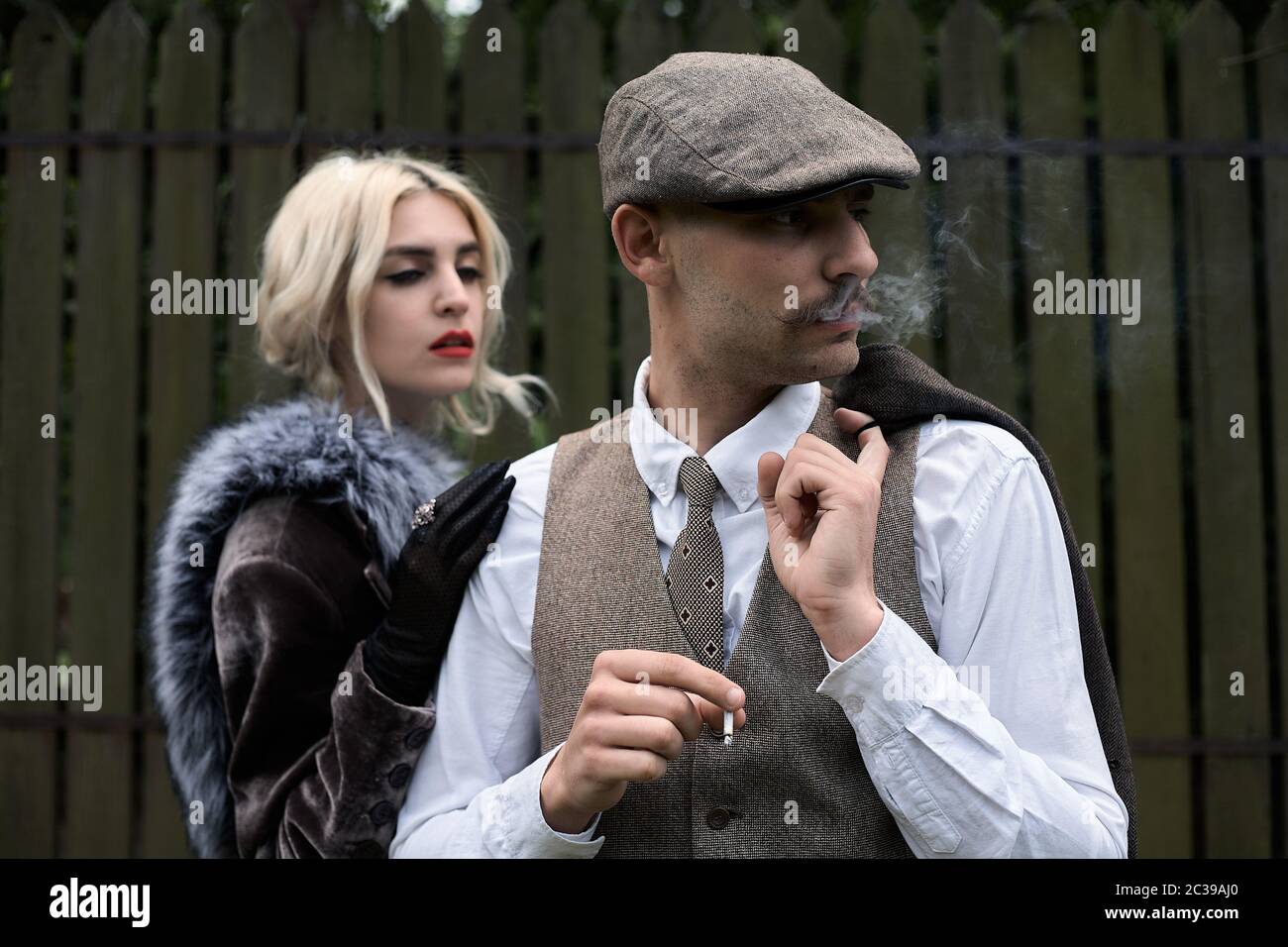 Portrait of a beautiful couple in vintage style. Retro style, classic ...