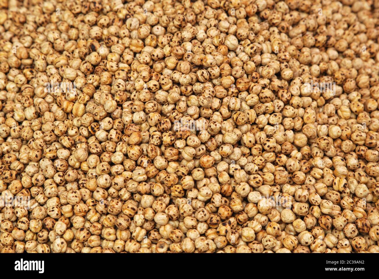 Roasted chickpea legume high protein snack texture Stock Photo - Alamy