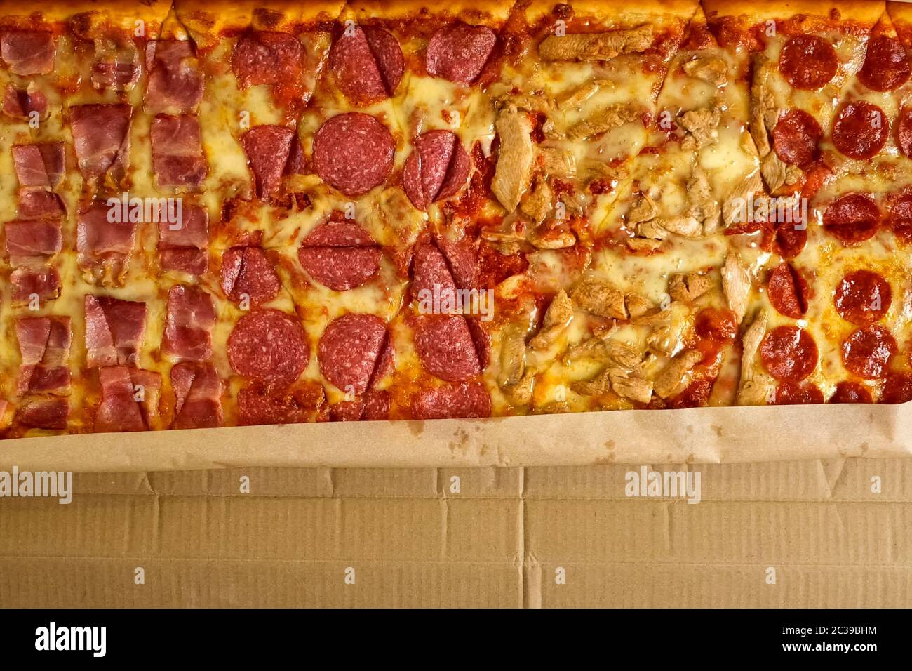 Long big sausage pizza. Long big sausage a pizza Stock Photo - Alamy