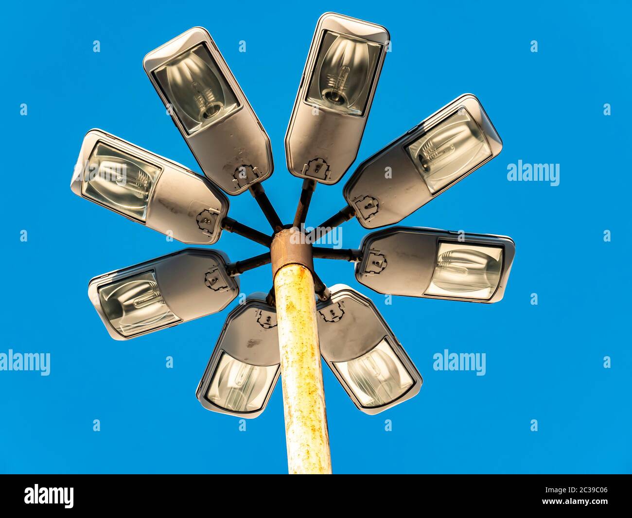 Street lights against the blue sky. Technology. Background image. Place ...