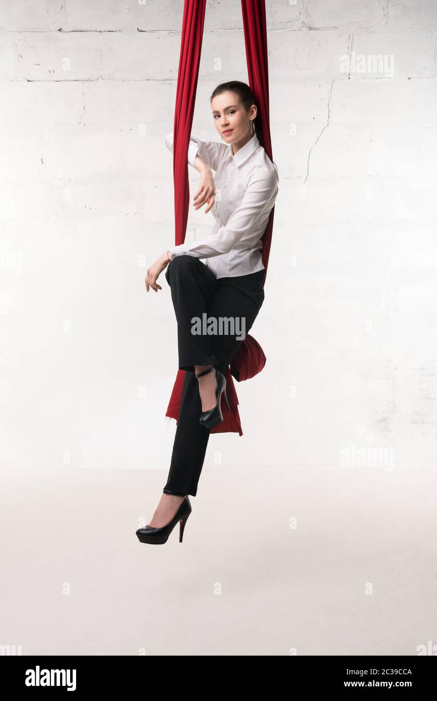 Woman sitting on her heel hi-res stock photography and images - Alamy