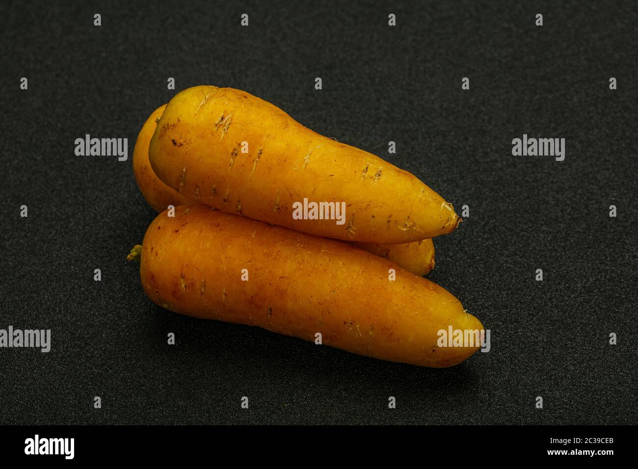 Natural vegan food - Raw Yellow carrot Stock Photo - Alamy