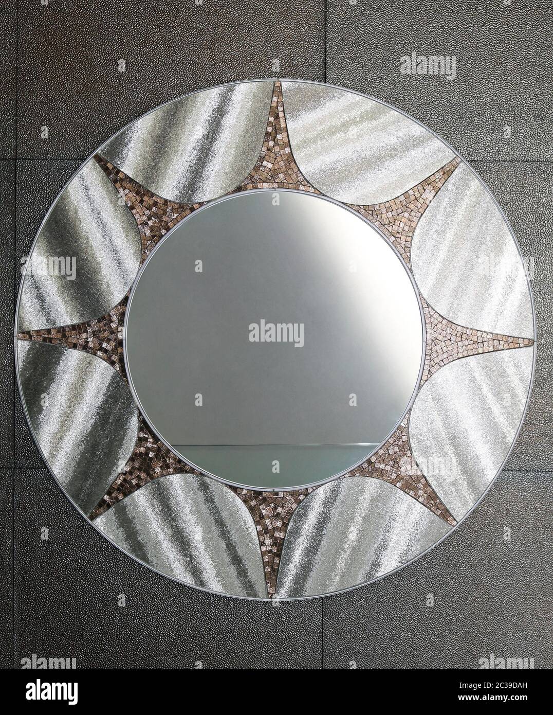 Round silver mirror at bathroom wall Stock Photo - Alamy