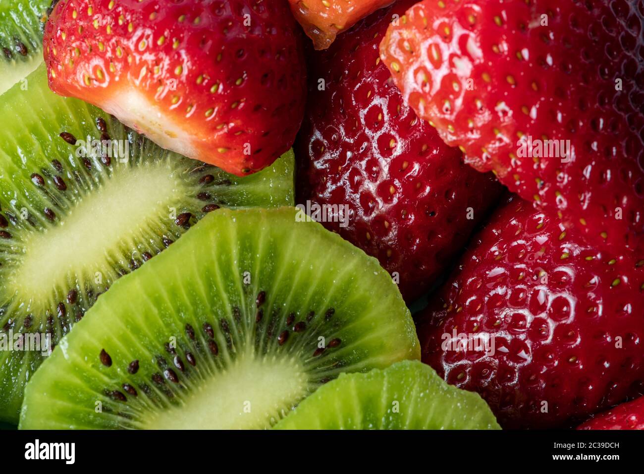exquisite fresh fruits for a cake or salad at dessert time Stock Photo ...