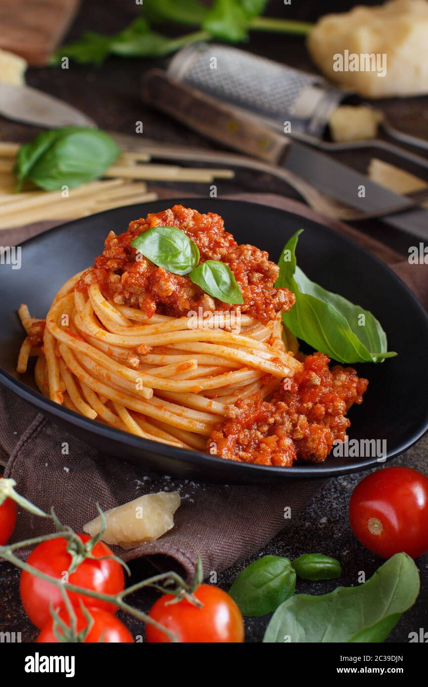 Spaghetti pasta with bolognese sauce with a fork close up Stock Photo ...