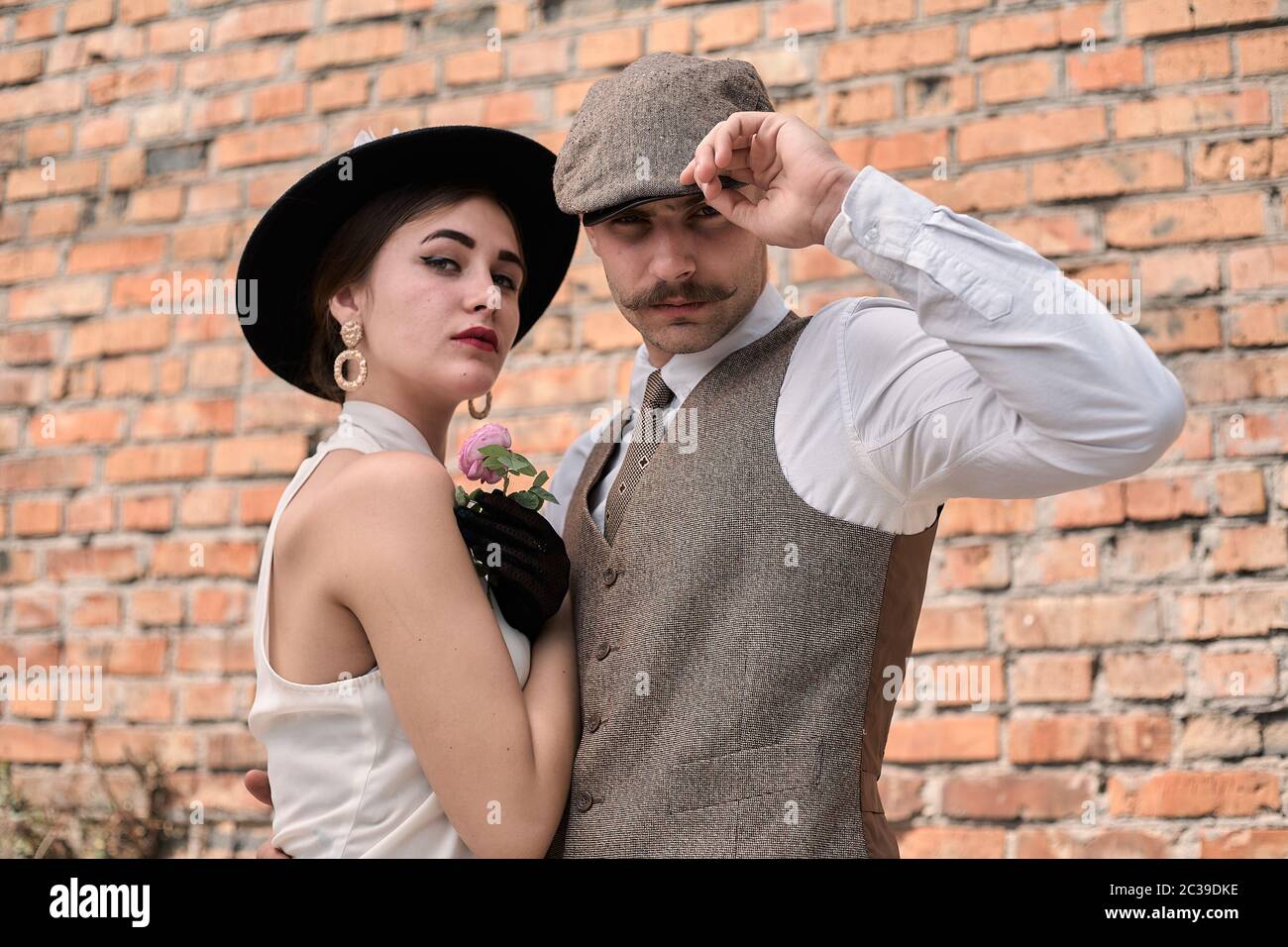 Portrait of a beautiful couple in vintage style. Retro style, classic ...