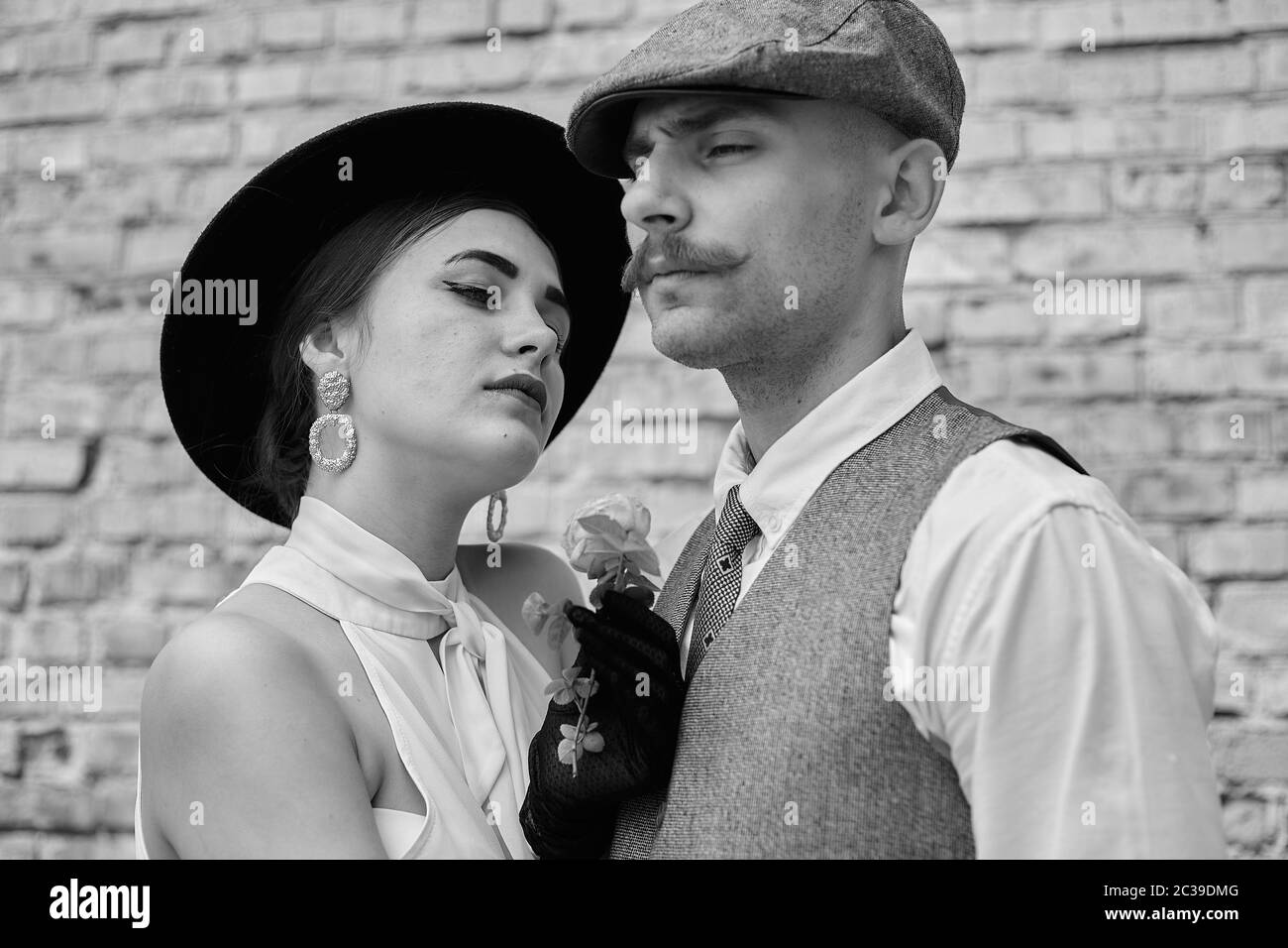 Portrait of a beautiful couple in vintage style. Retro style, classic ...