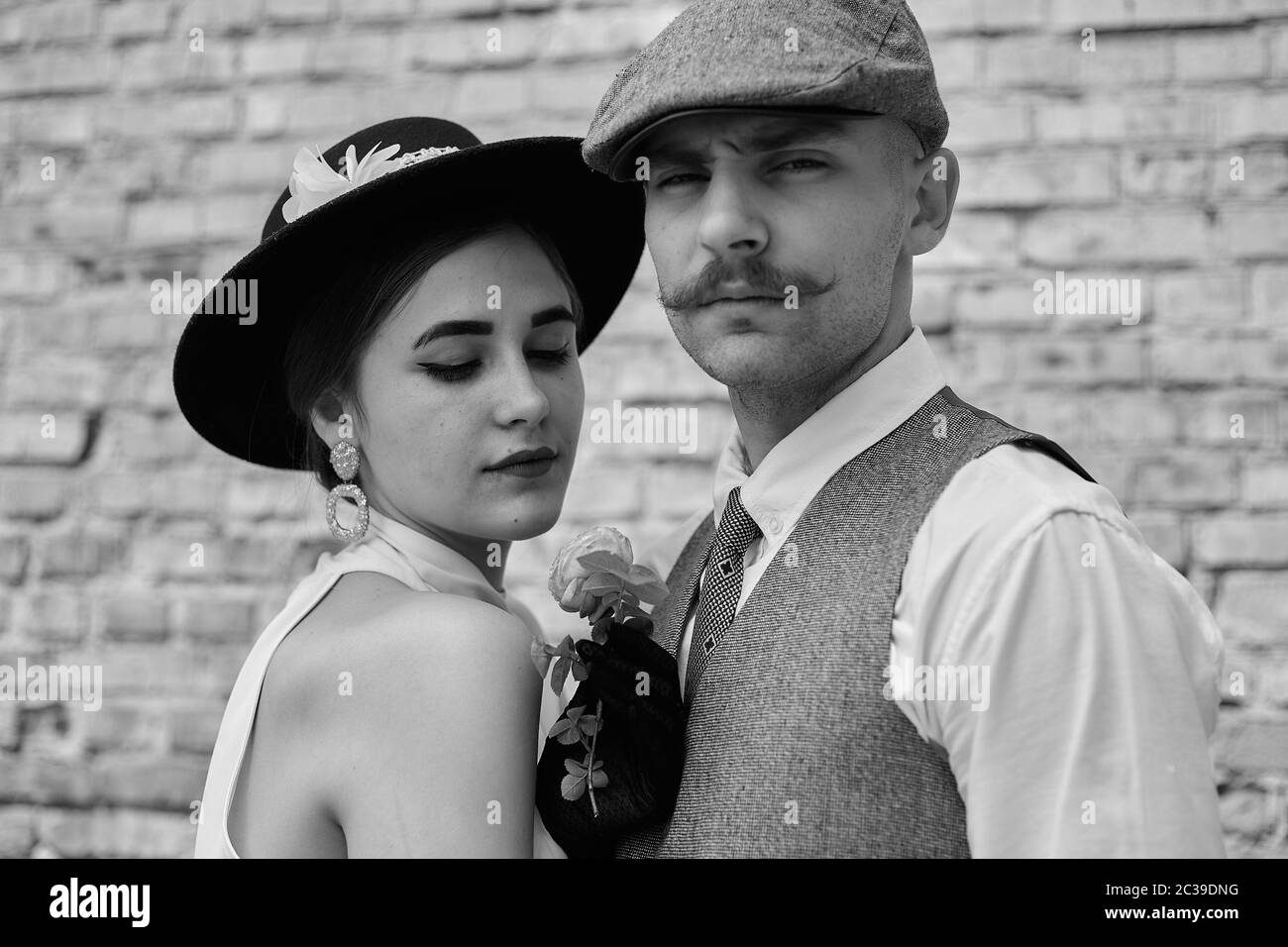 Portrait of a beautiful couple in vintage style. Retro style, classic ...