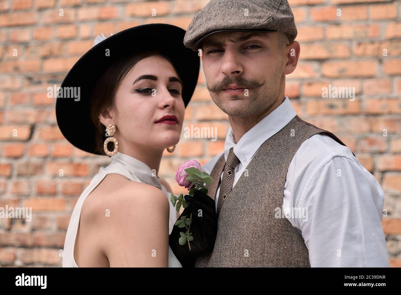 Portrait of a beautiful couple in vintage style. Retro style, classic ...