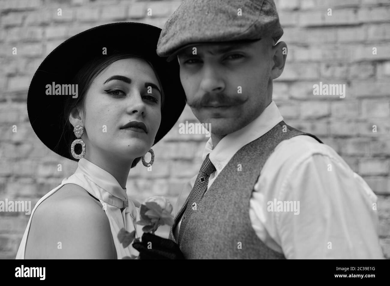 Portrait of a beautiful couple in vintage style. Retro style, classic ...