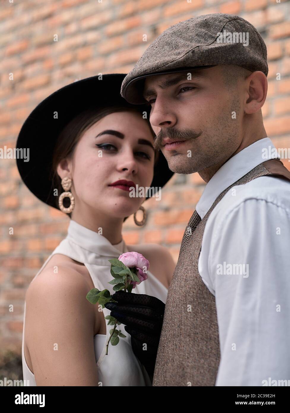 Portrait of a beautiful couple in vintage style. Retro style, classic ...