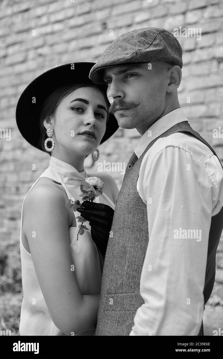 Portrait of a beautiful couple in vintage style. Retro style, classic ...