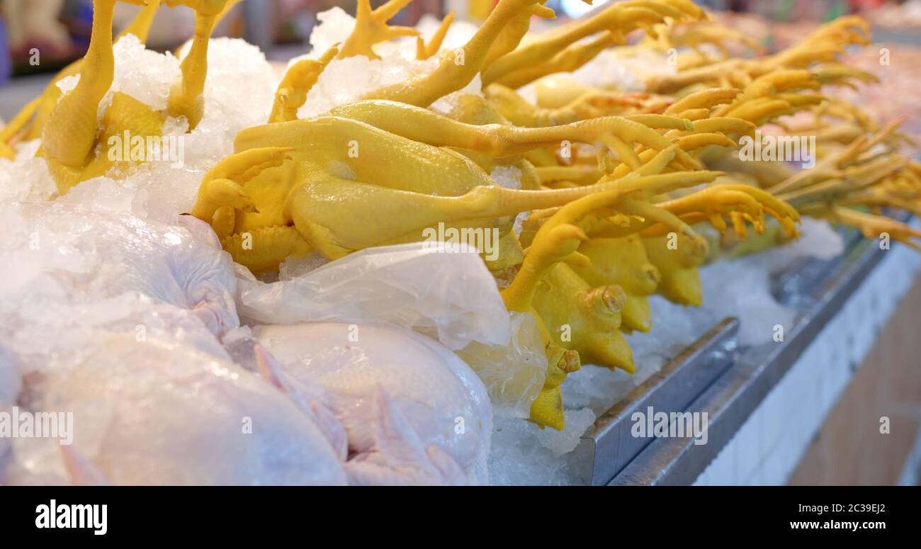Raw chicken sell in wet market Stock Photo - Alamy