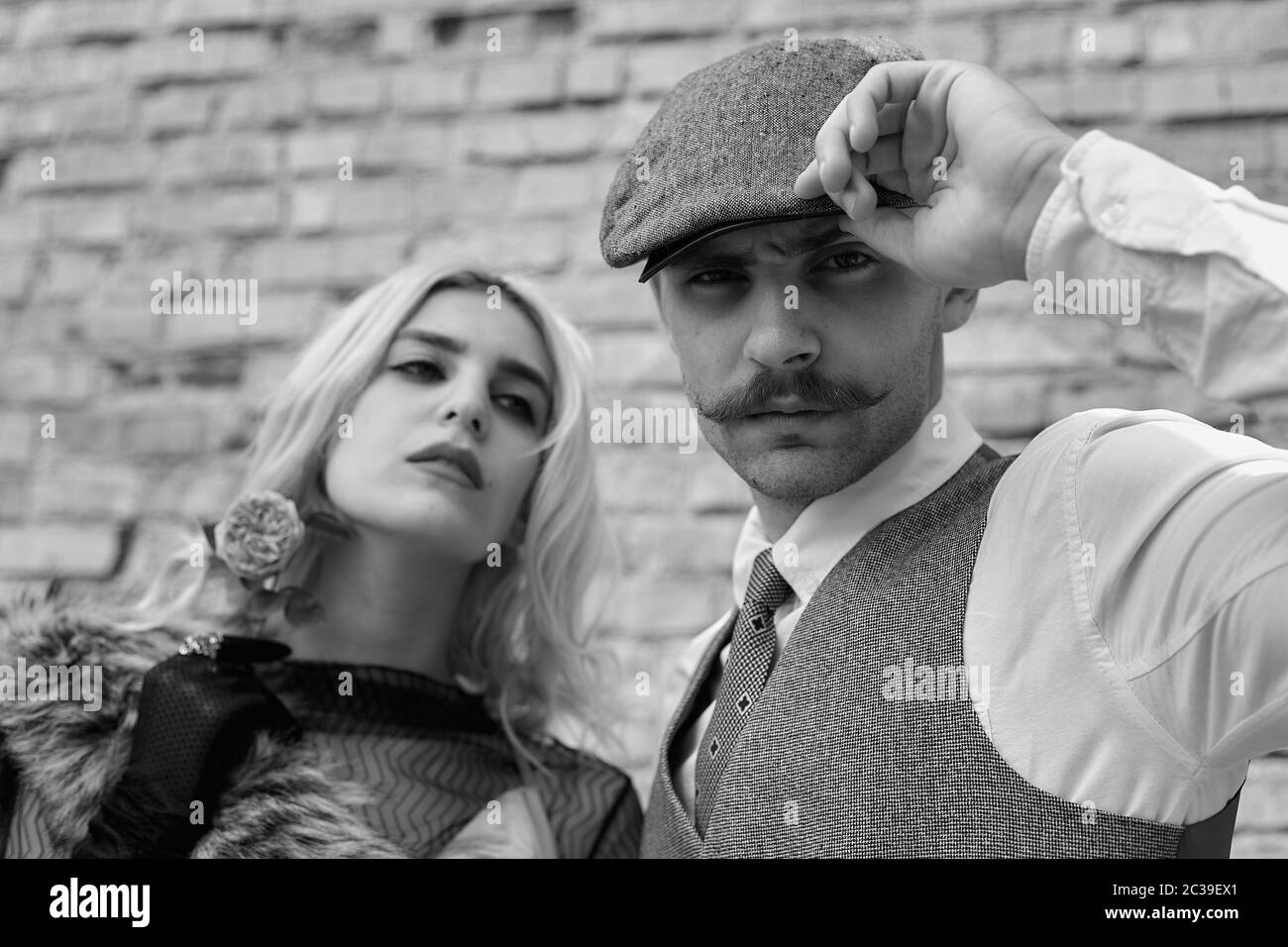 Portrait of a beautiful couple in vintage style. Retro style, classic ...