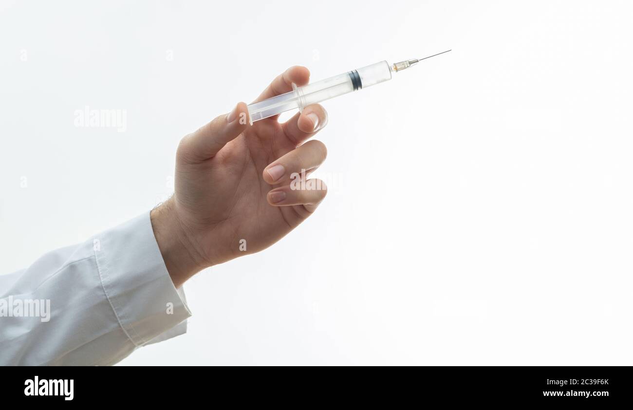 Medicine vaccination. Doctor hand injecting vaccine with syringe ...