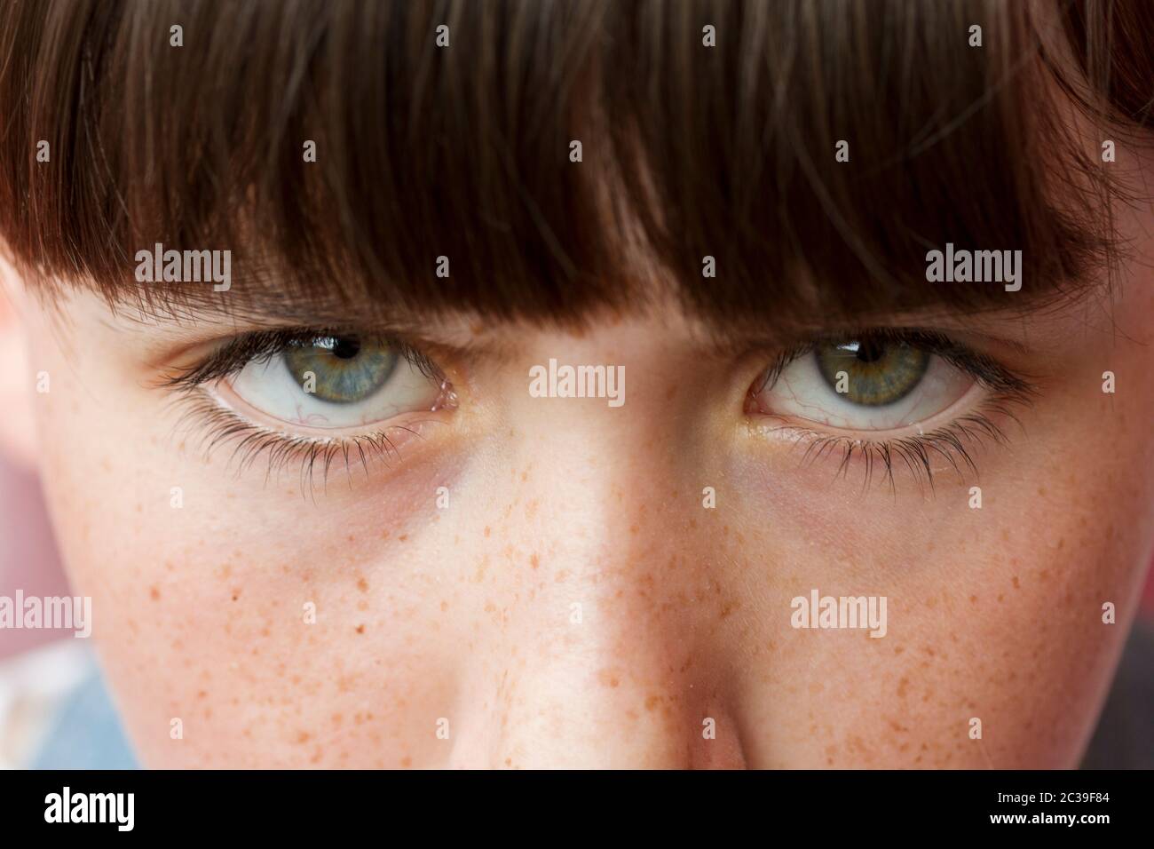 Ten year old girl with angry expression Stock Photo - Alamy