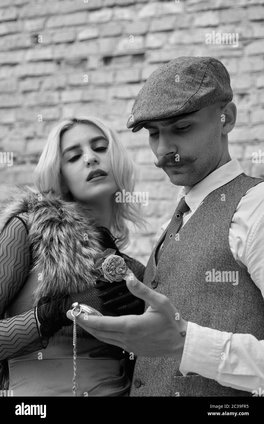 Portrait of a beautiful couple in vintage style. Retro style, classic ...