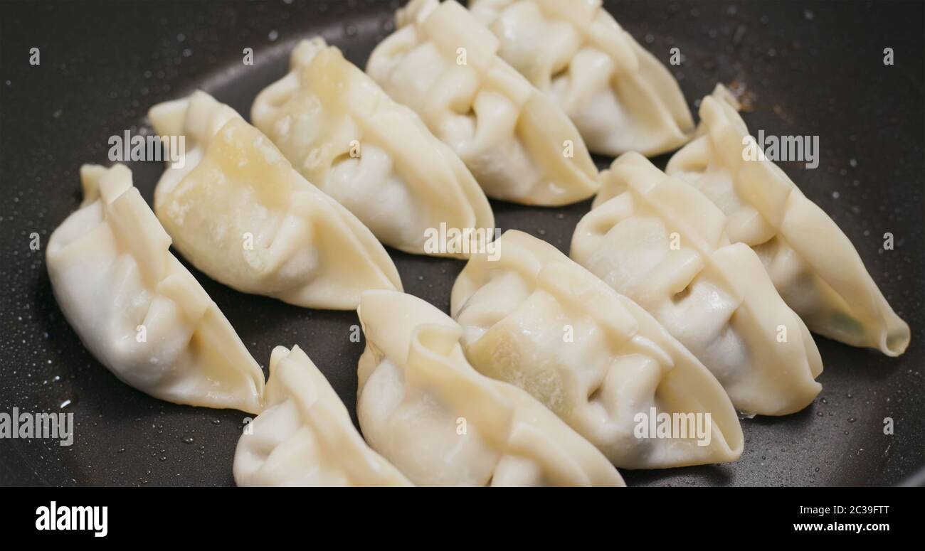 Fry japanese meat dumpling in hi-res stock photography and images - Alamy