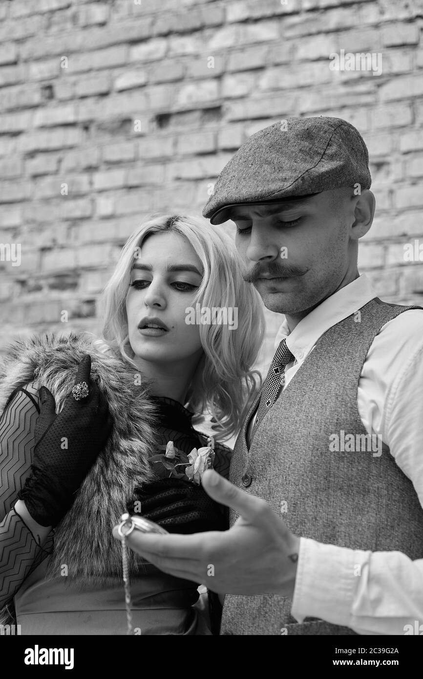 Portrait of a beautiful couple in vintage style. Retro style, classic ...