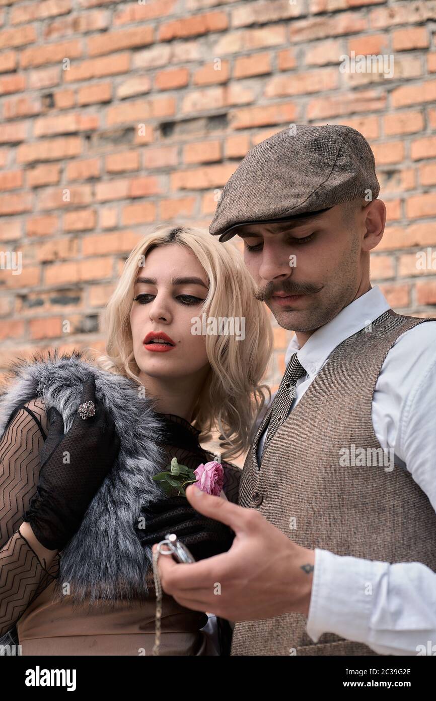 Portrait of a beautiful couple in vintage style. Retro style, classic ...