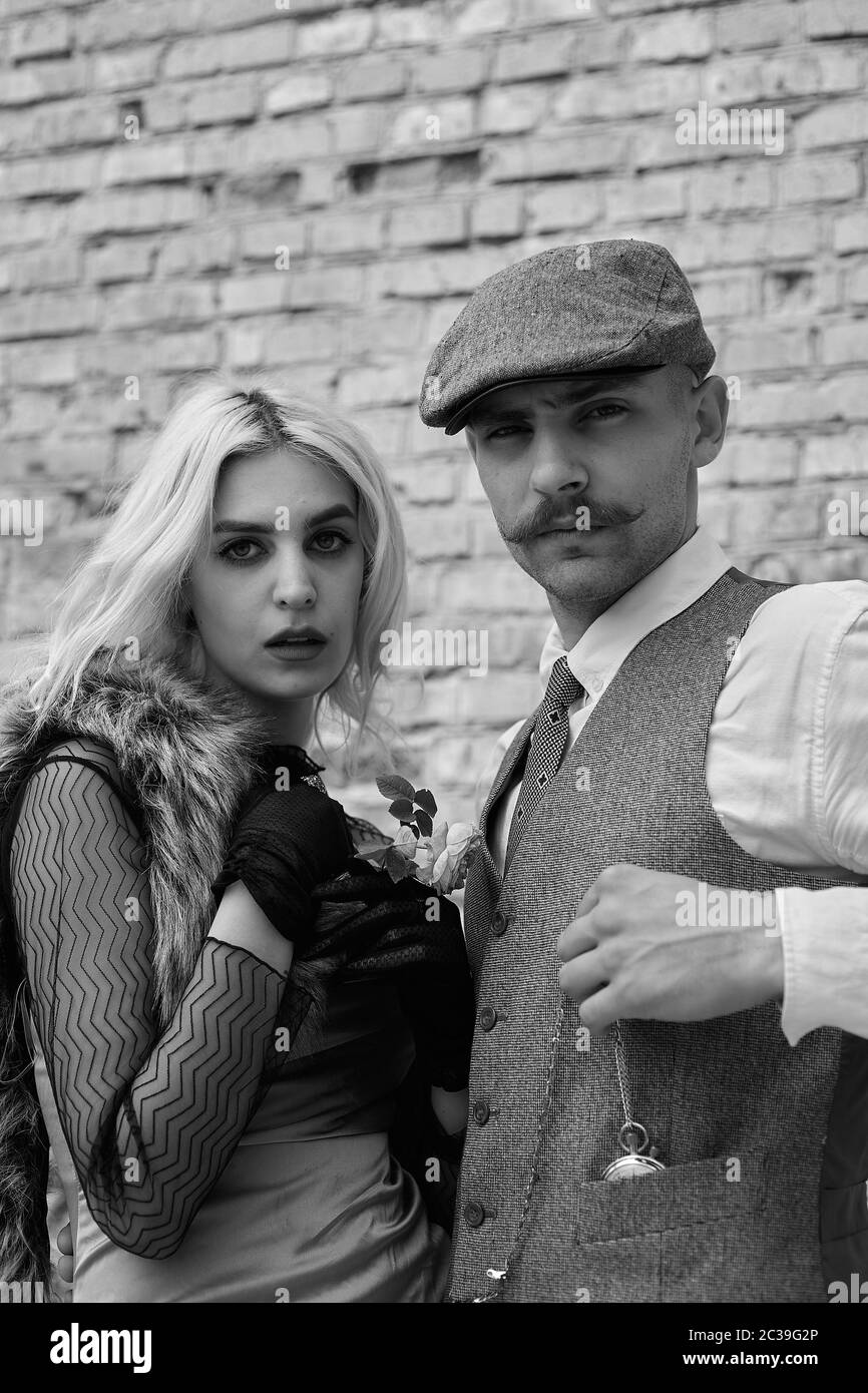 Portrait of a beautiful couple in vintage style. Retro style, classic ...