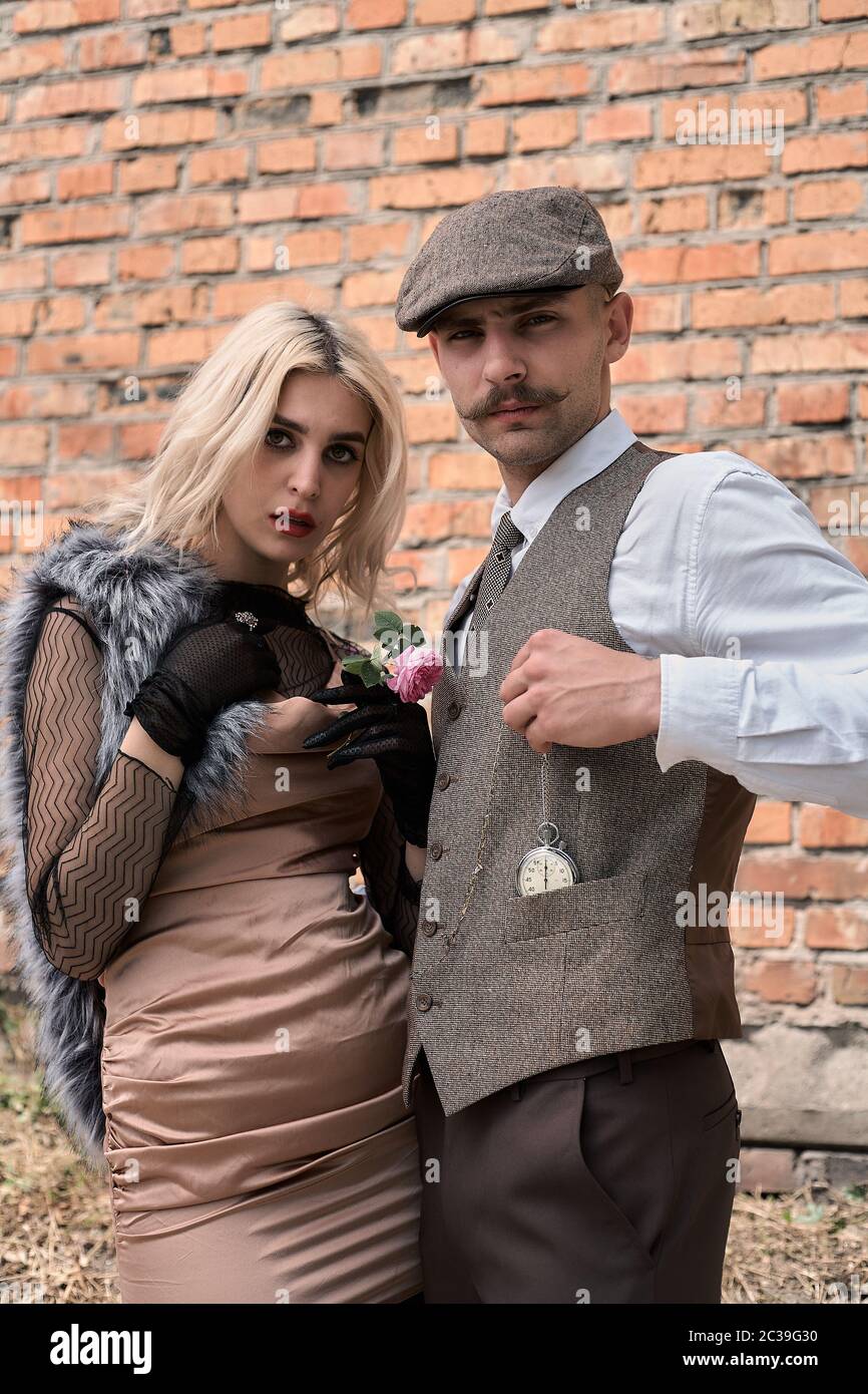 Portrait of a beautiful couple in vintage style. Retro style, classic ...
