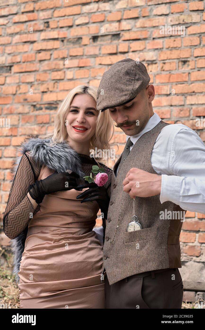 Portrait of a beautiful couple in vintage style. Retro style, classic ...