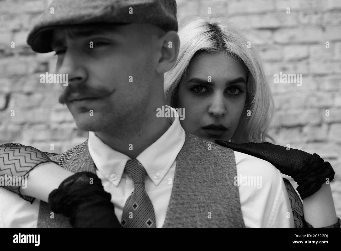 Portrait of a beautiful couple in vintage style. Retro style, classic ...