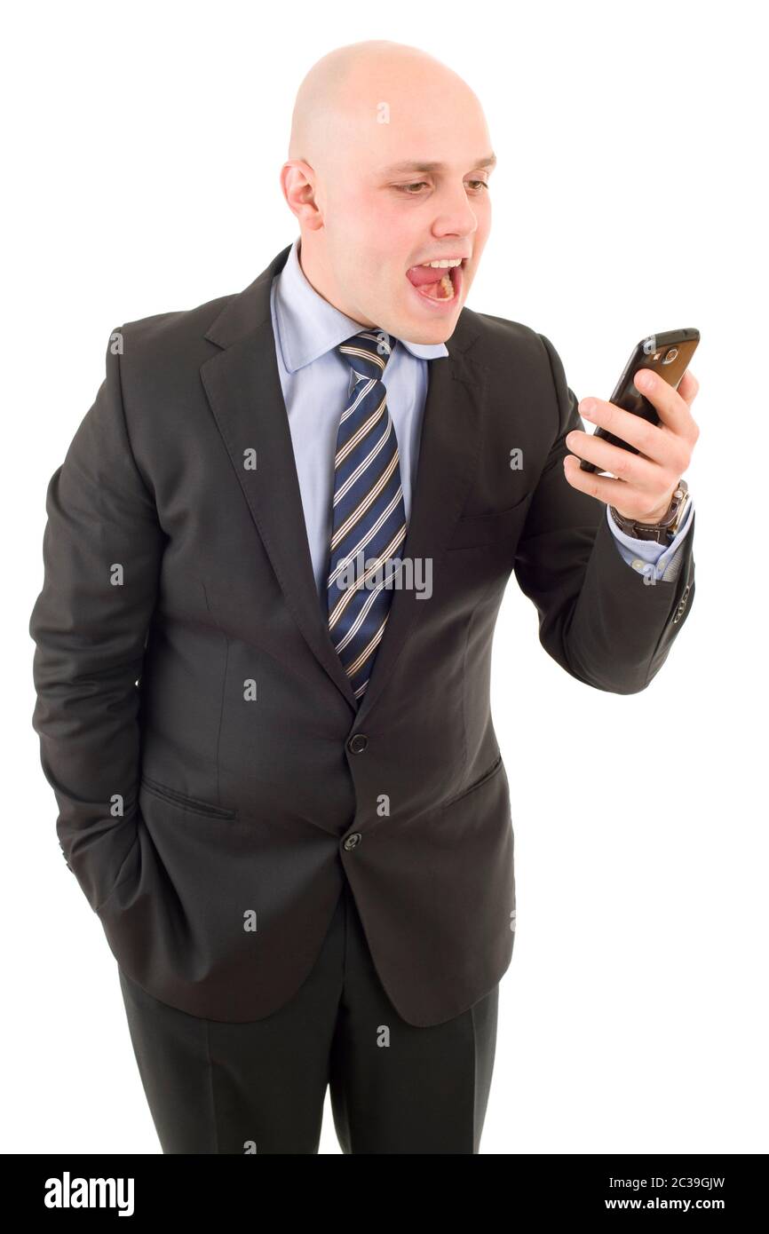 Angry businessman yelling into a cellphone. Isolated on white ...