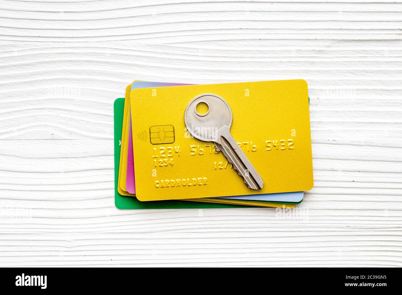 Credit card security concept with key on white desk top-down Stock ...