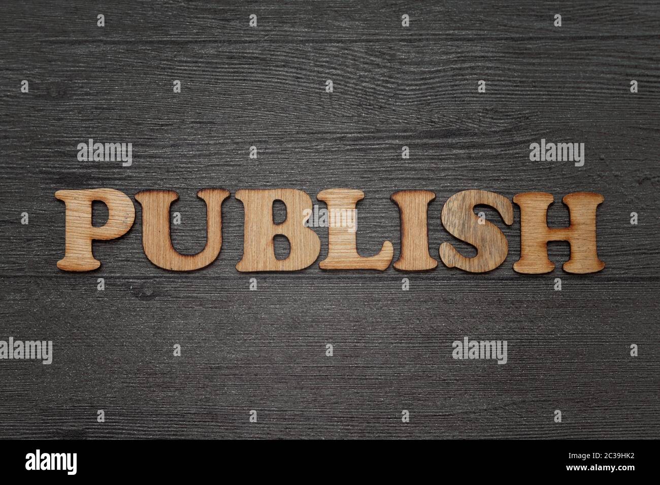 Publish text word concept, wooden lettering alphabet typography over ...