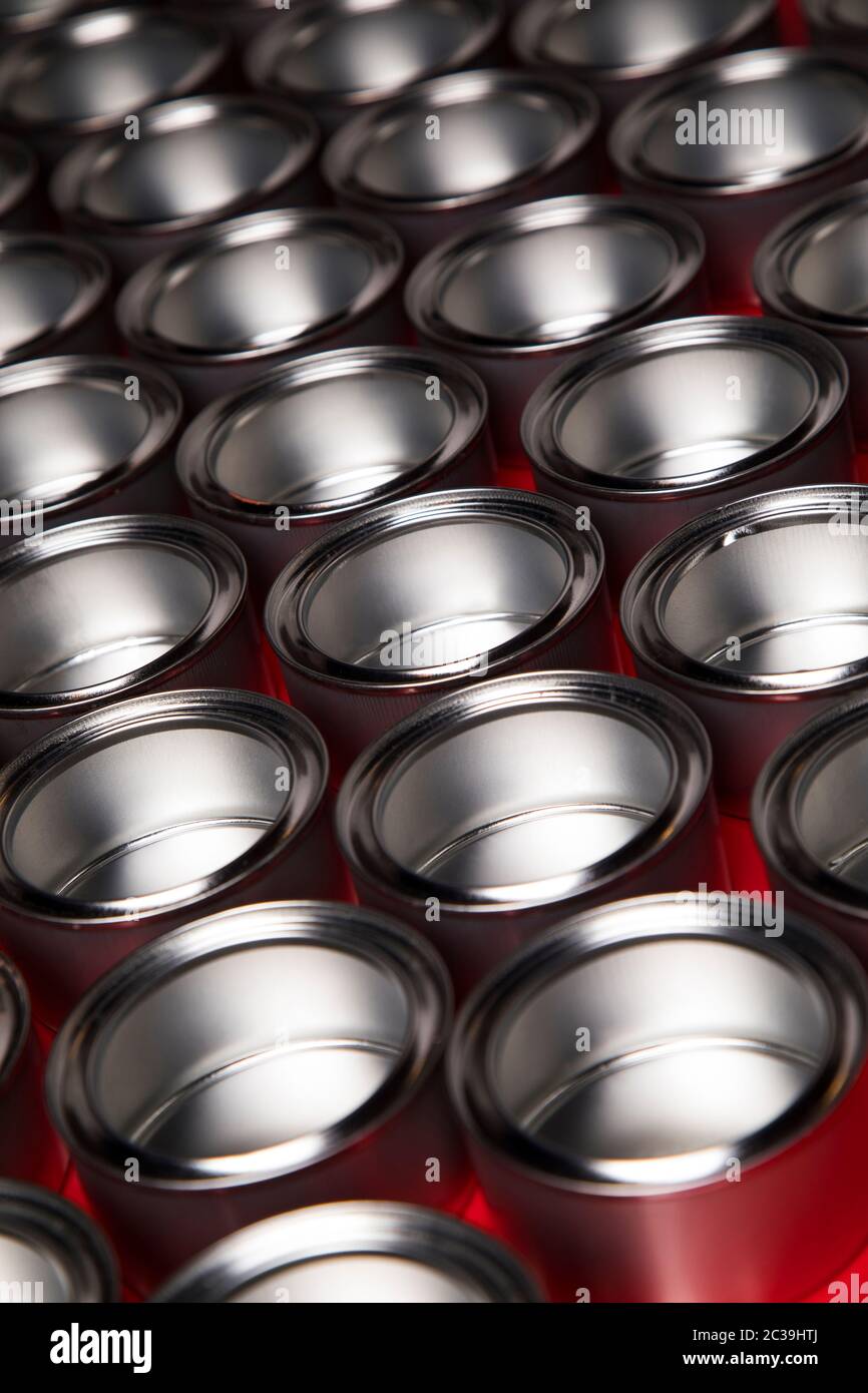Group of tin metal cans with color paint Stock Photo - Alamy