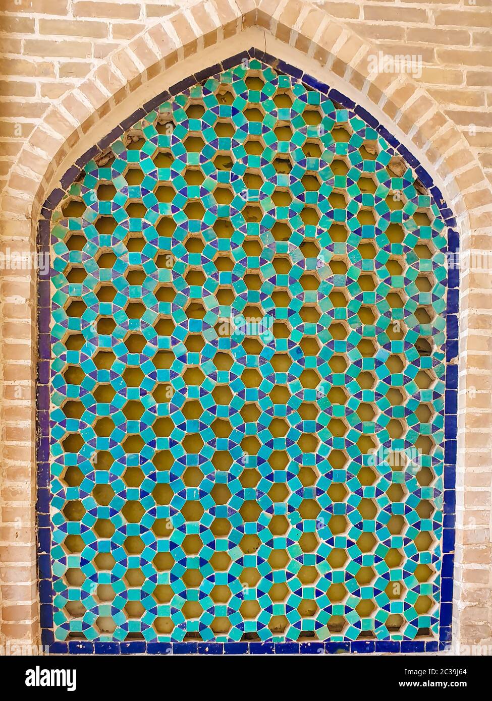 traditional Uzbek pattern on the ceramic tile on the wall of the mosque ...