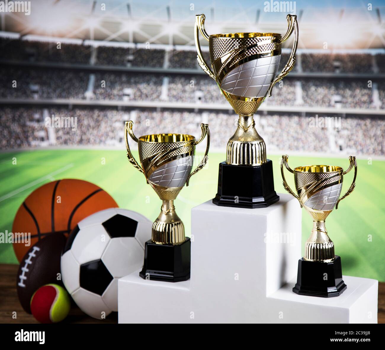 Podium for sports awards, equipment and balls Stock Photo - Alamy