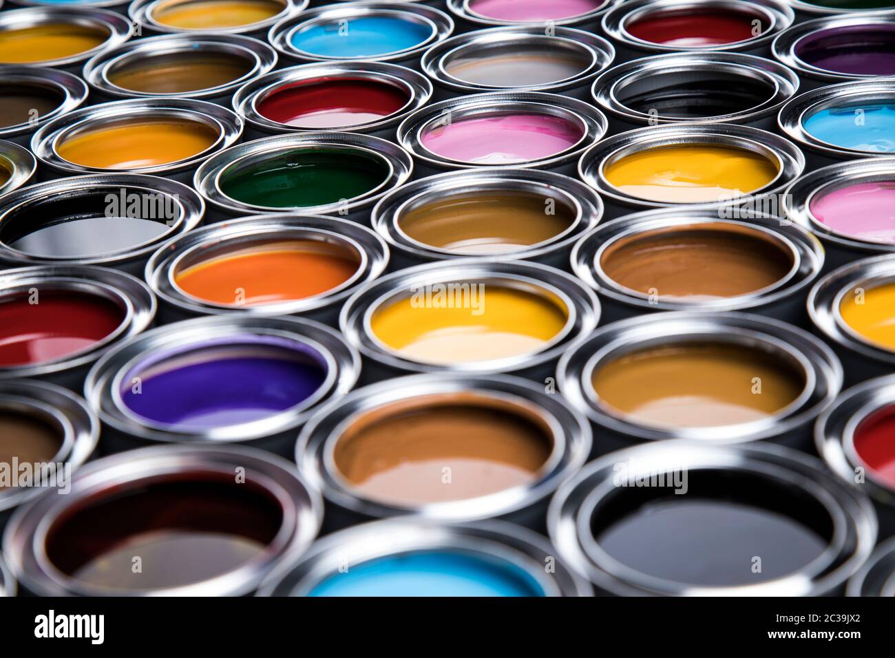 Group of tin metal cans with color paint Stock Photo - Alamy
